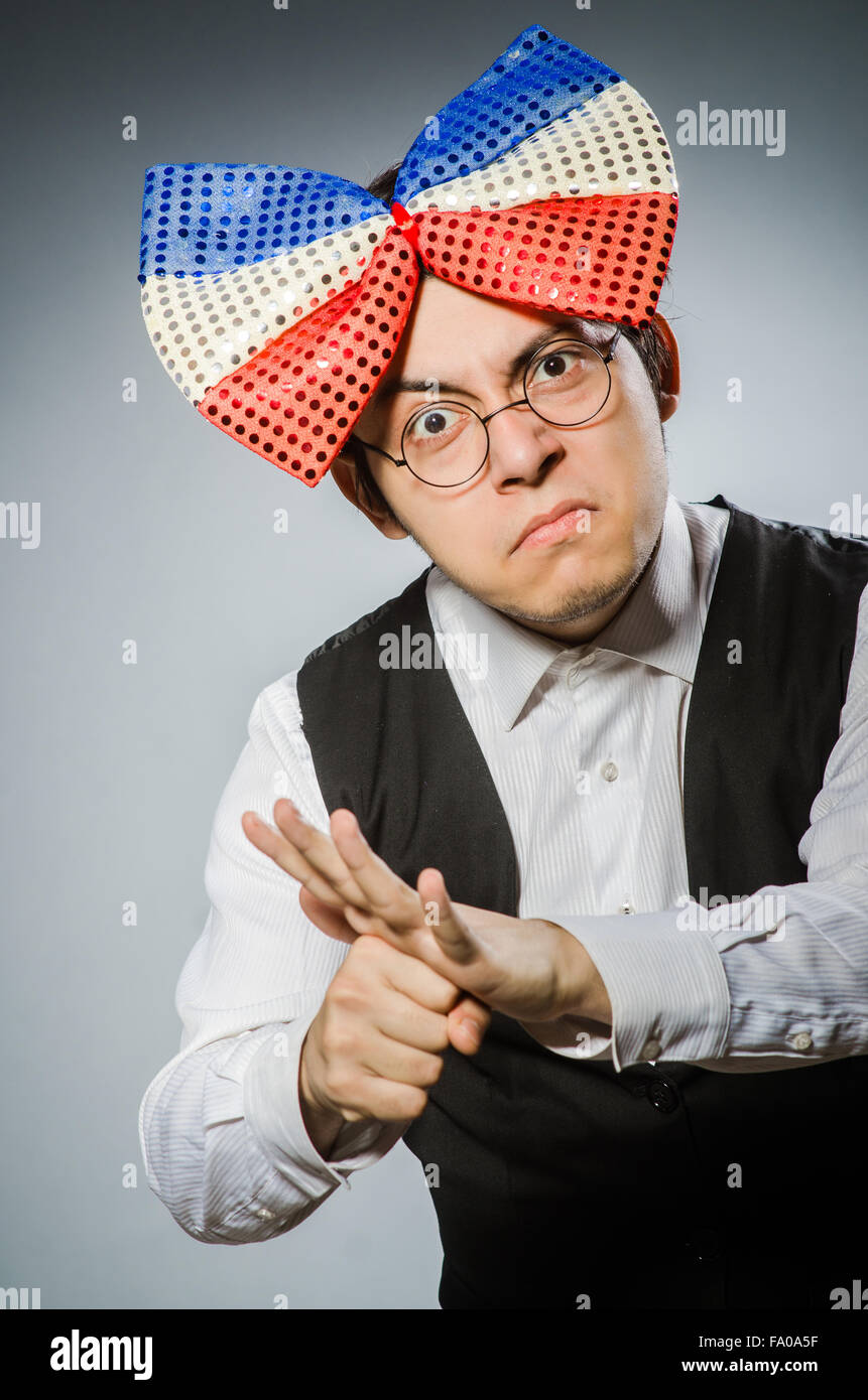 Funny man with giant bow tie Stock Photo - Alamy