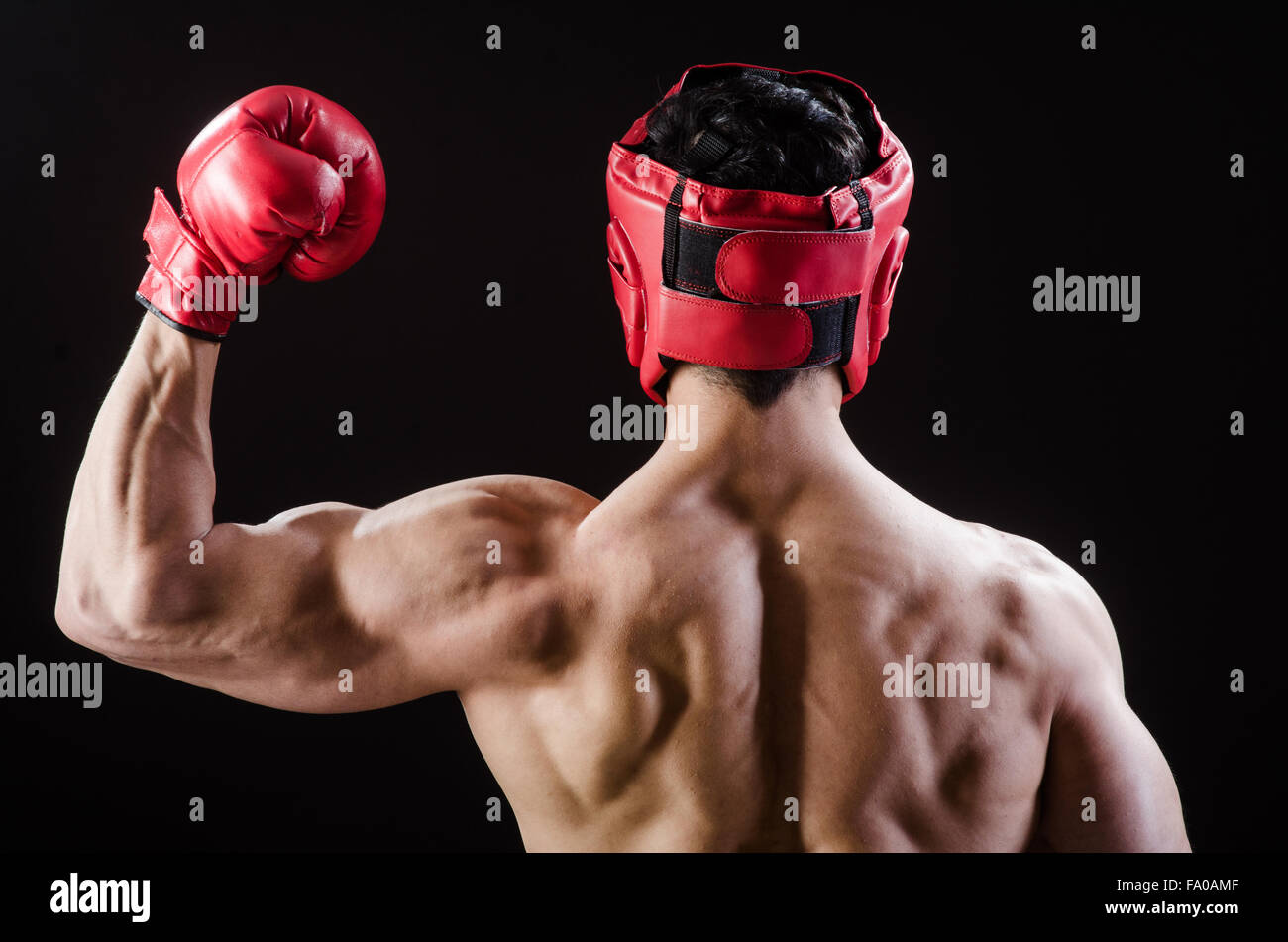 Muscular man in boxing concept Stock Photo - Alamy