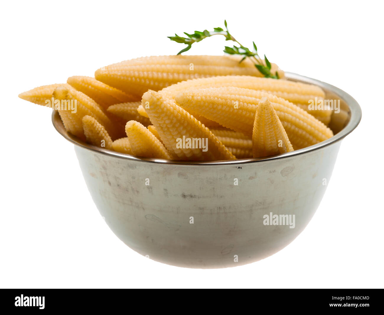 Baby corn with thyme Stock Photo - Alamy