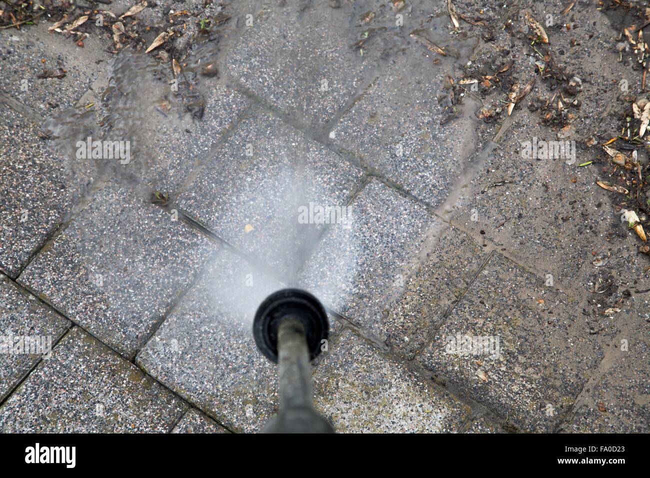 Outdoor floor cleaning with high pressure water jet Stock Photo - Alamy