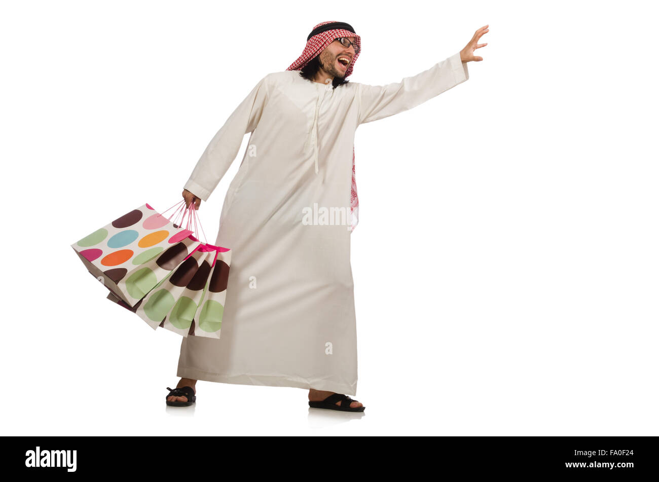 Arab man with shopping bags on white Stock Photo - Alamy