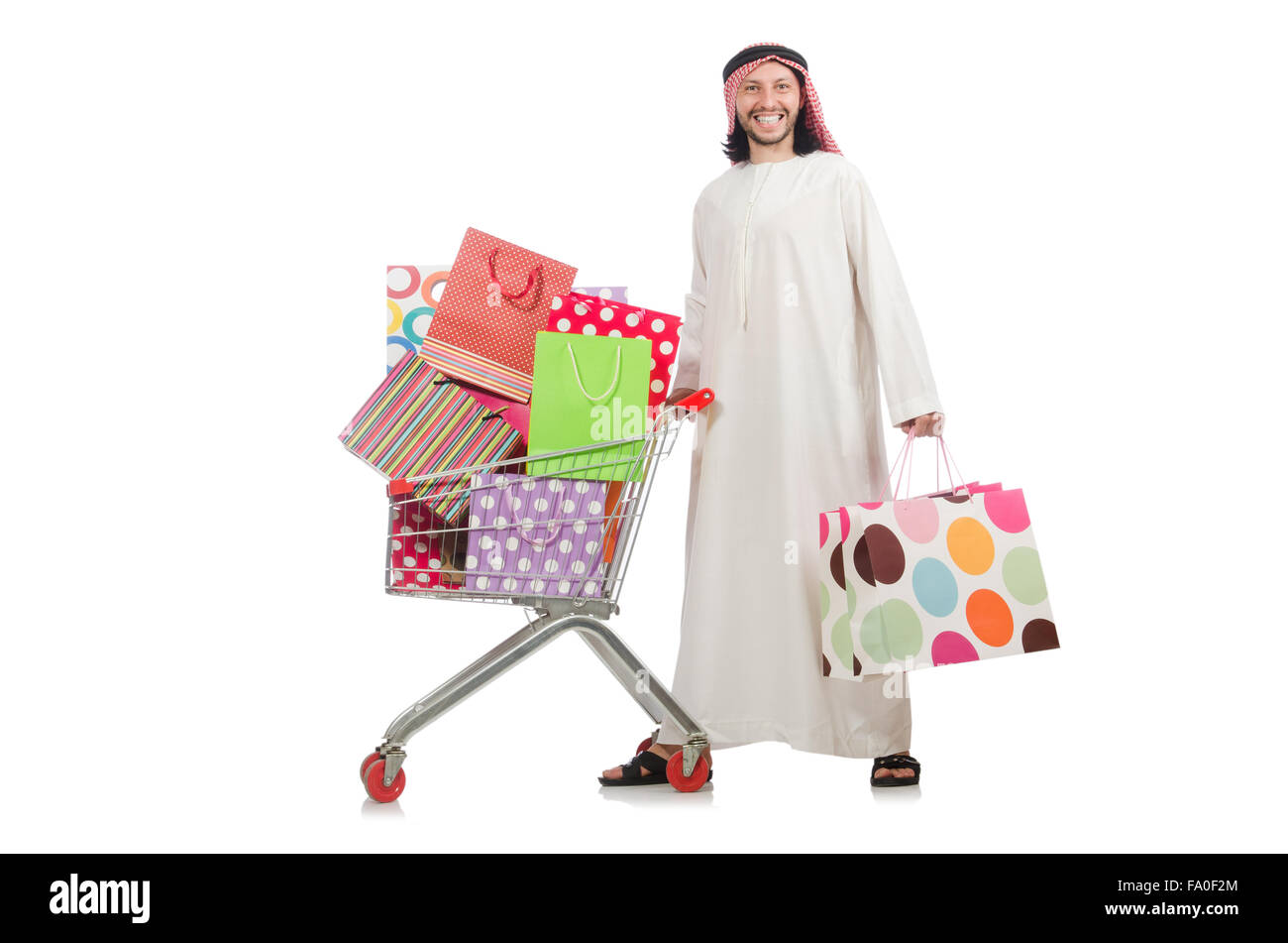 Arab man doing shopping isolated on white Stock Photo - Alamy