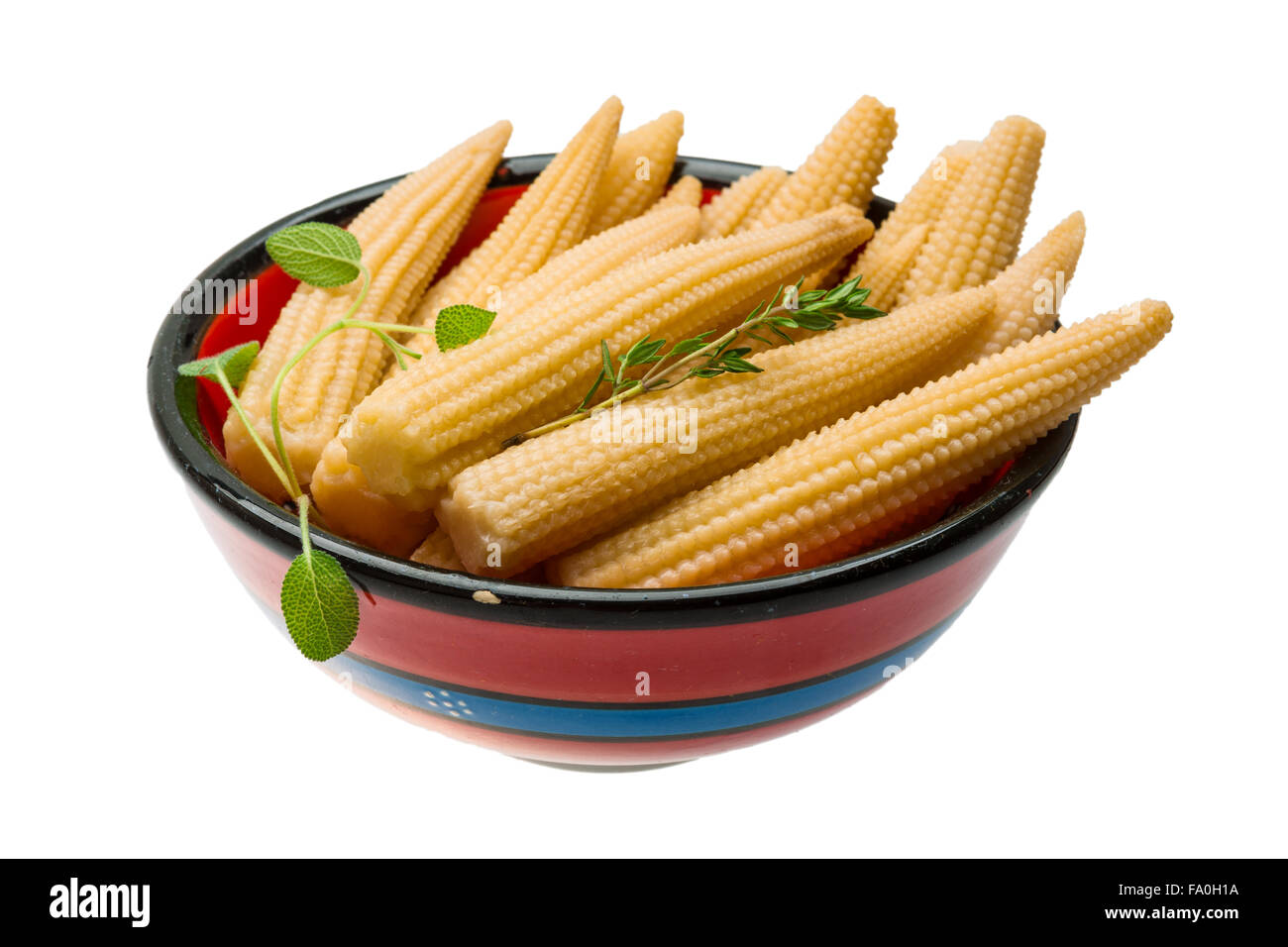 Baby corn with thyme Stock Photo - Alamy