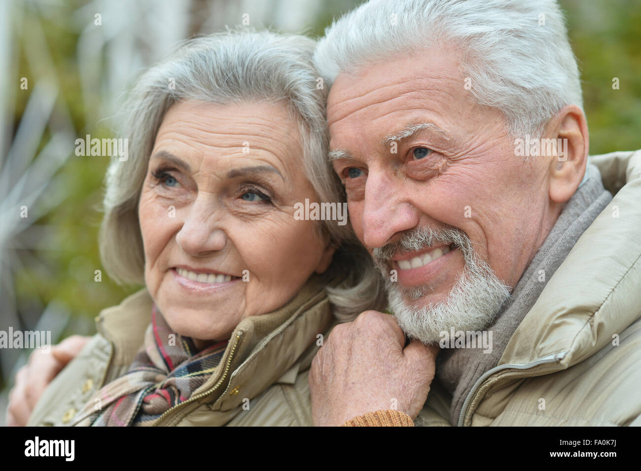 Mature couple walking Stock Photo - Alamy