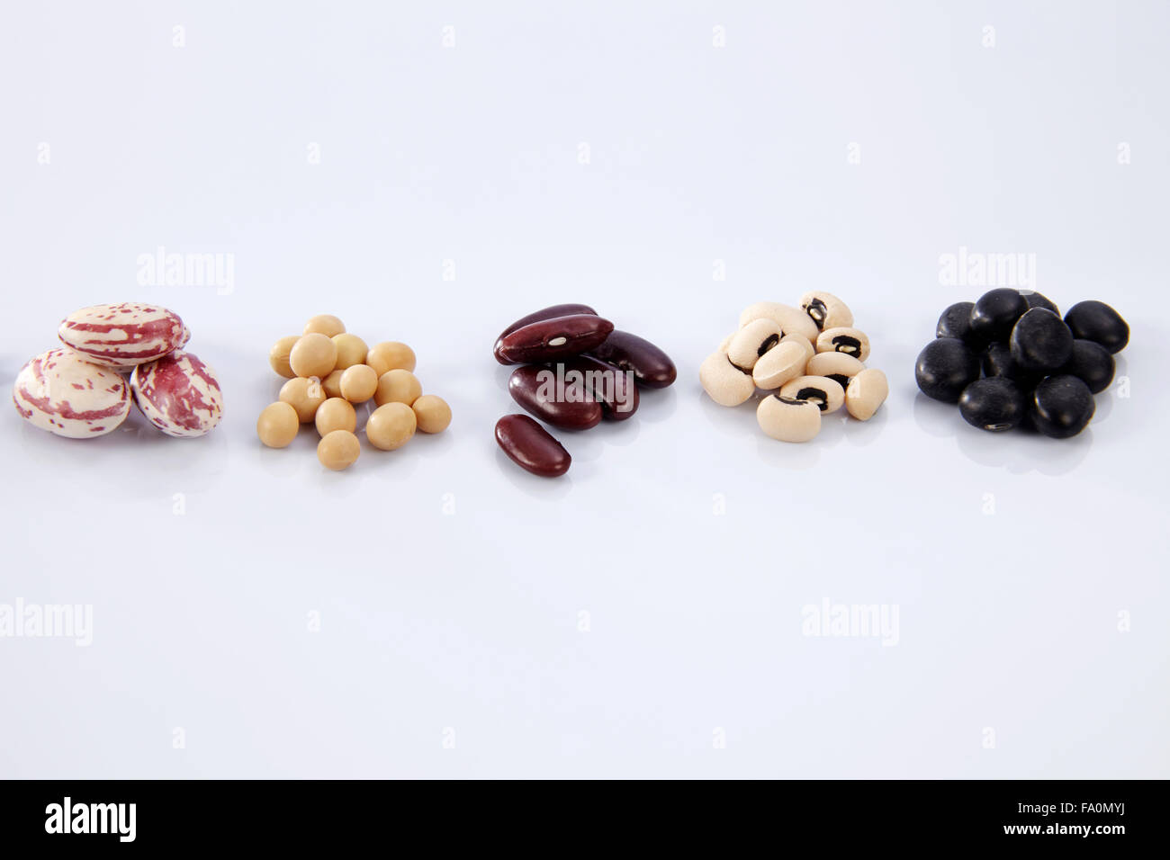 assorted beans on the white background Stock Photo - Alamy