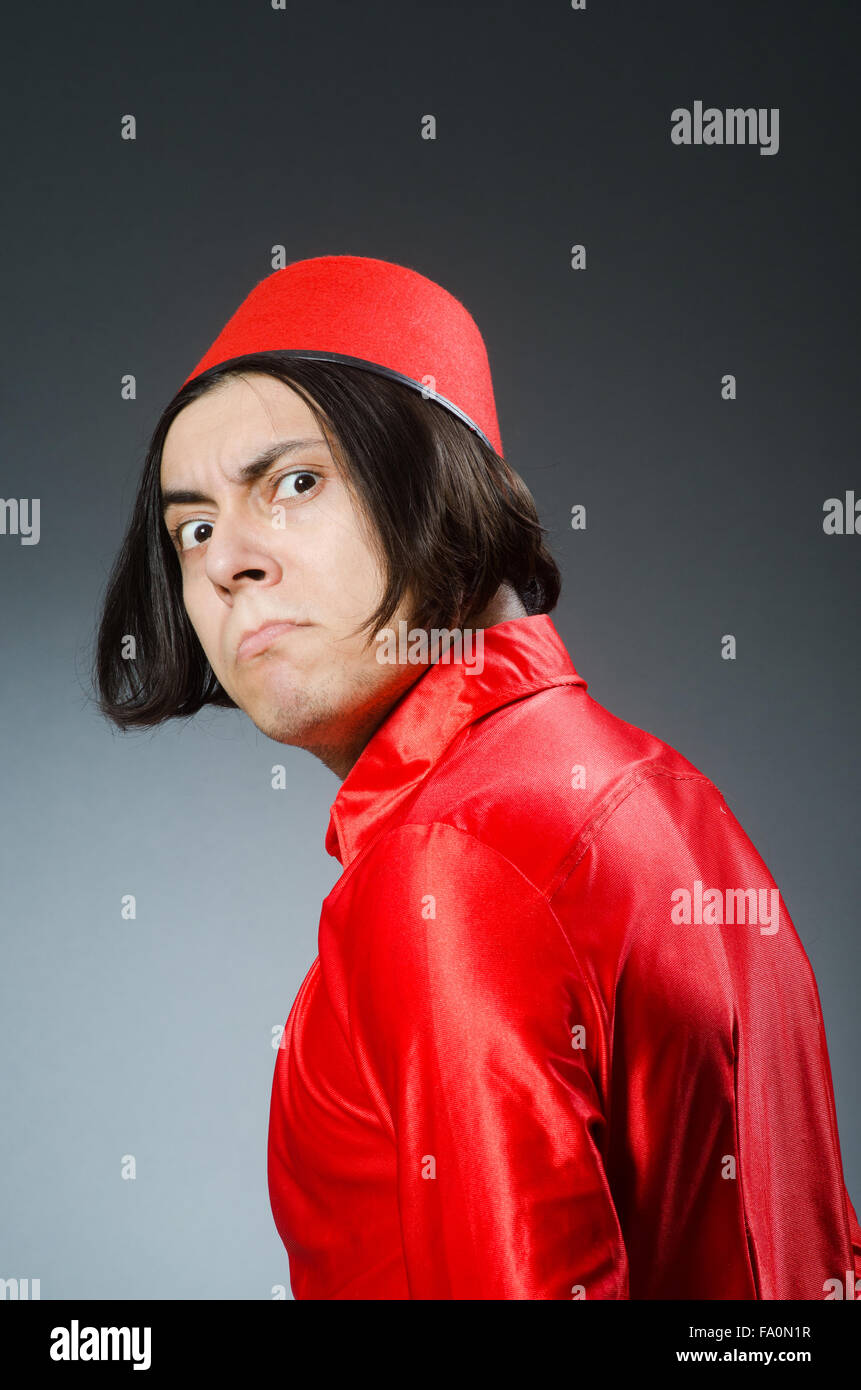 Man wearing red fez hat Stock Photo - Alamy