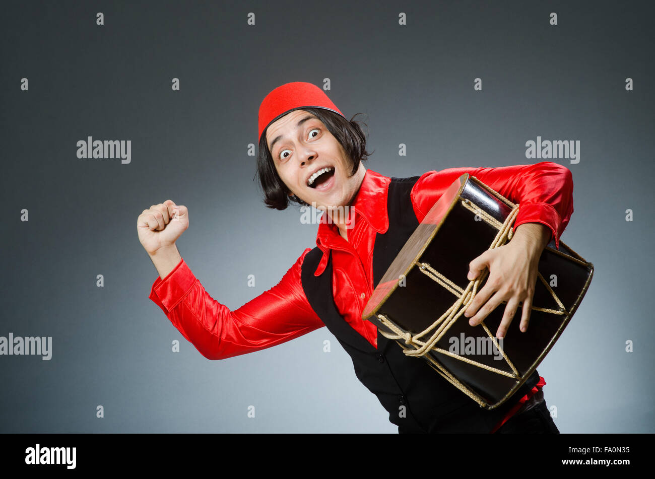 Man wearing red fez hat Stock Photo - Alamy