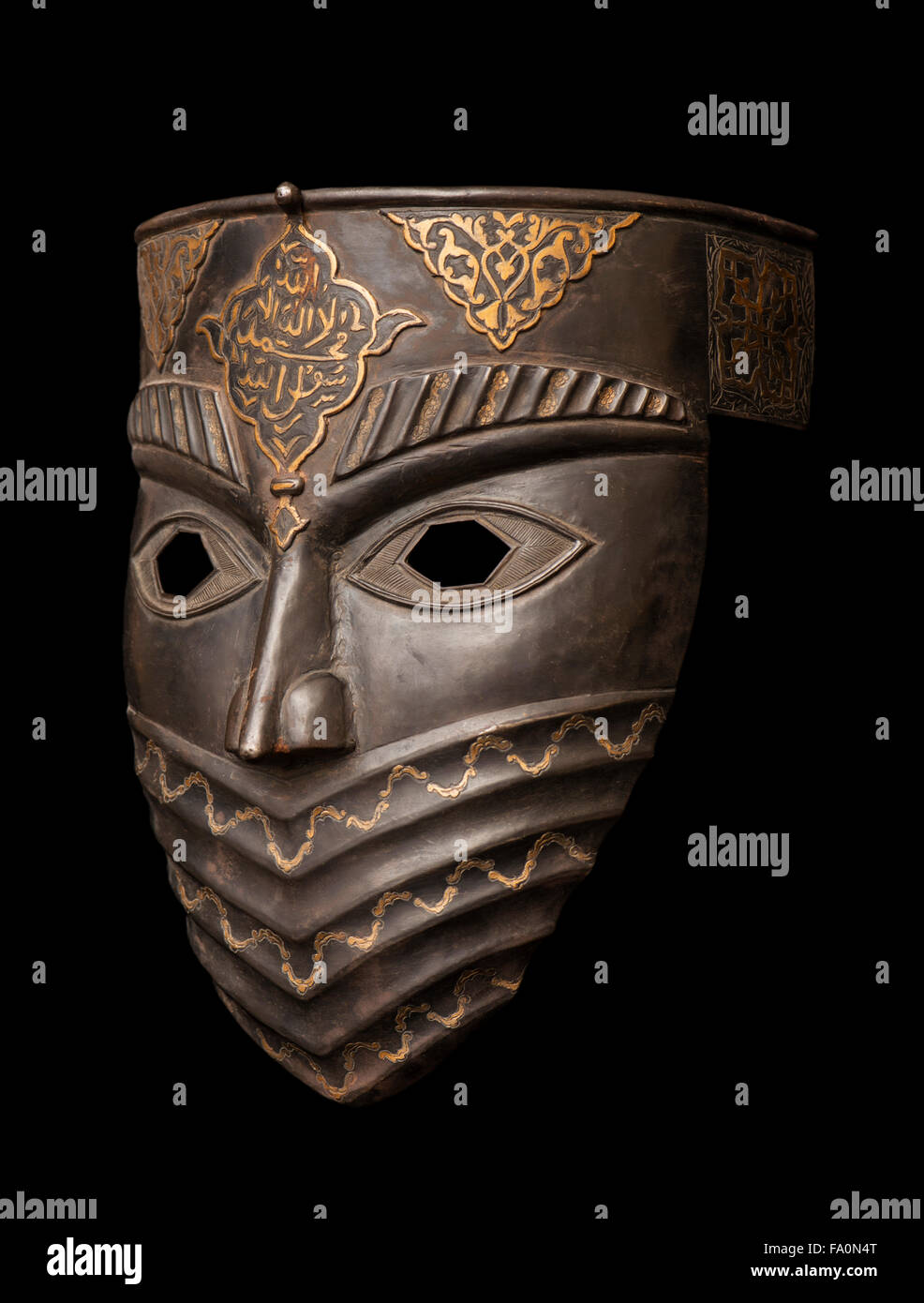 Metal mask isolated on black Stock Photo - Alamy