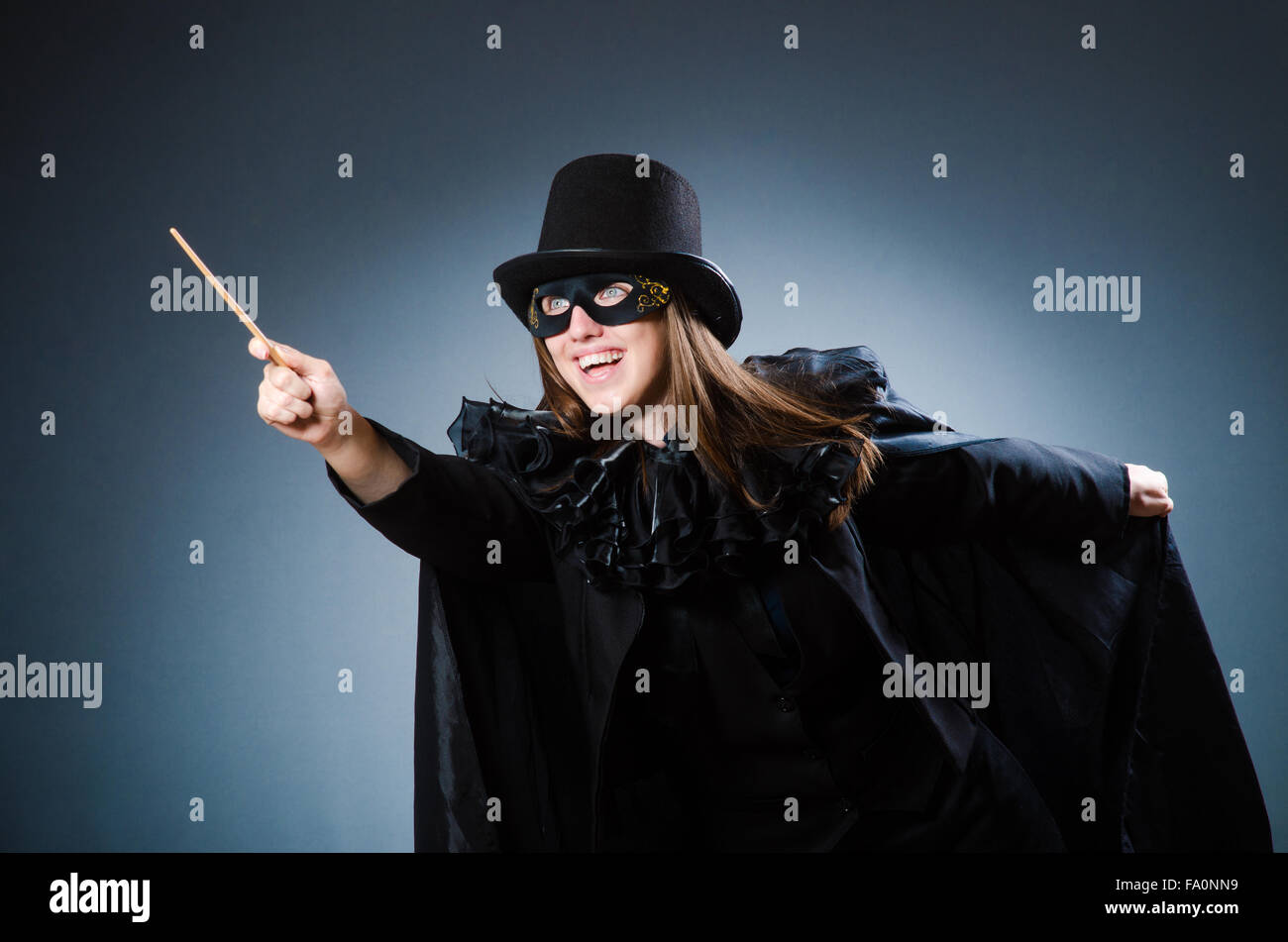 Woman magician in funny concept Stock Photo - Alamy