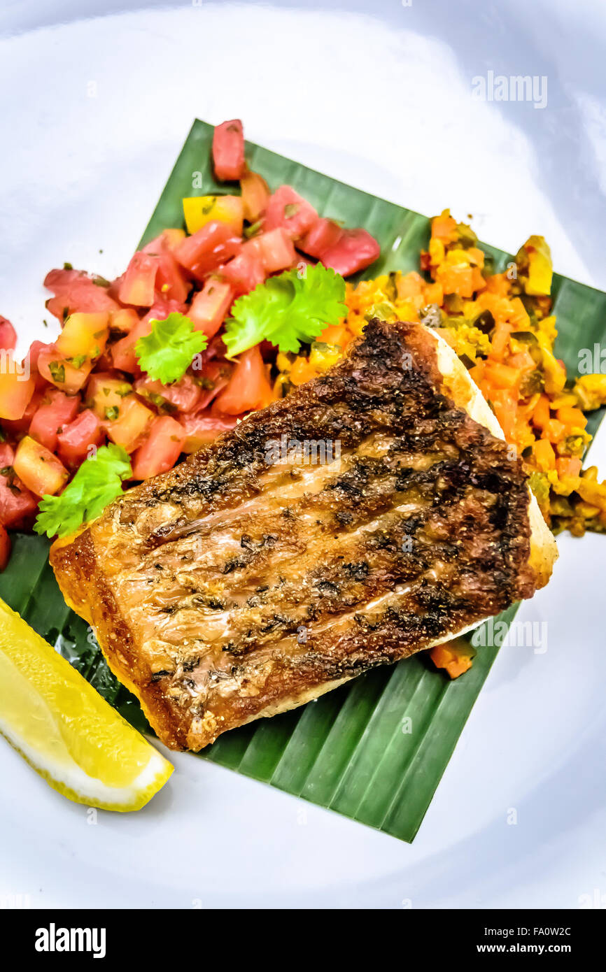 Pan fried white snapper Stock Photo - Alamy