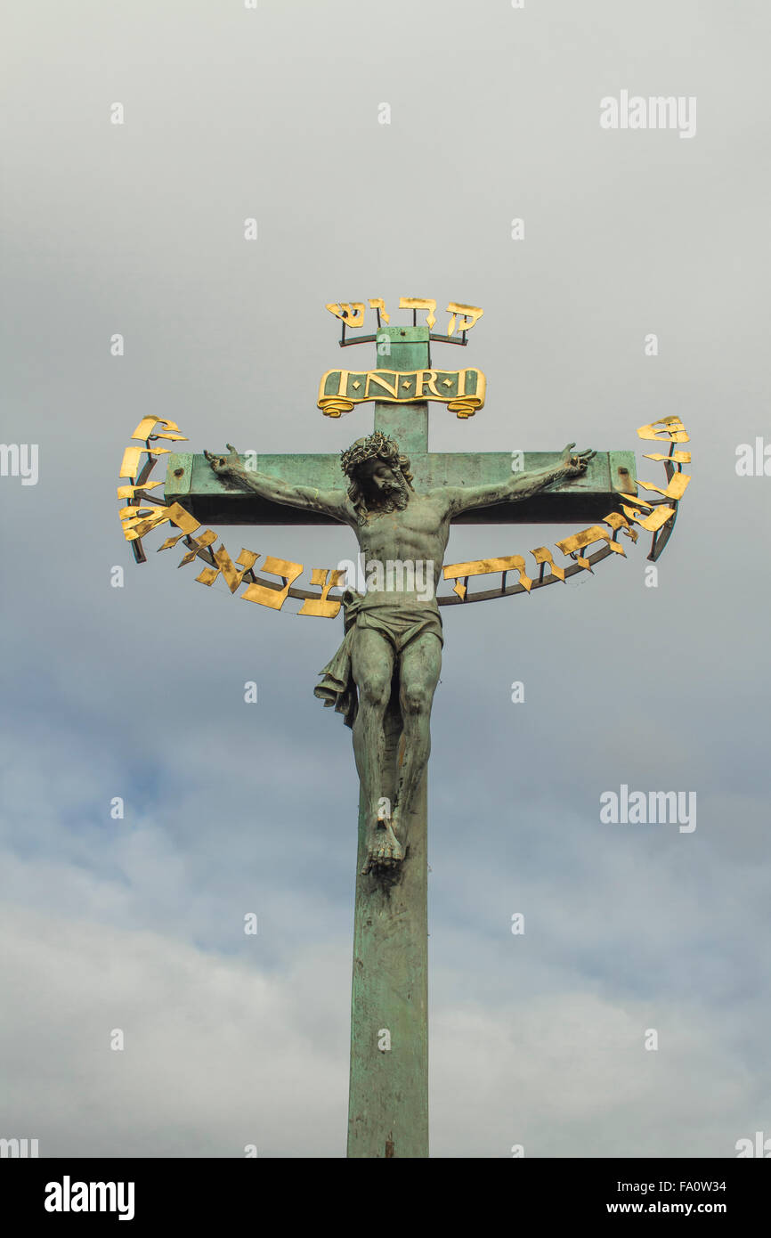 Statue of the Crucifix and Calvary at Charles Bridge in Prague Stock ...