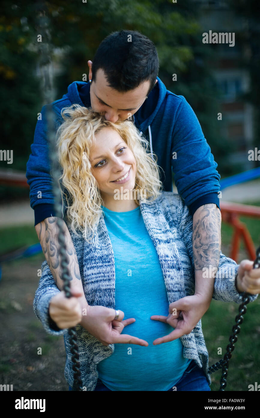Young pregnant couple on the spring Stock Photo - Alamy