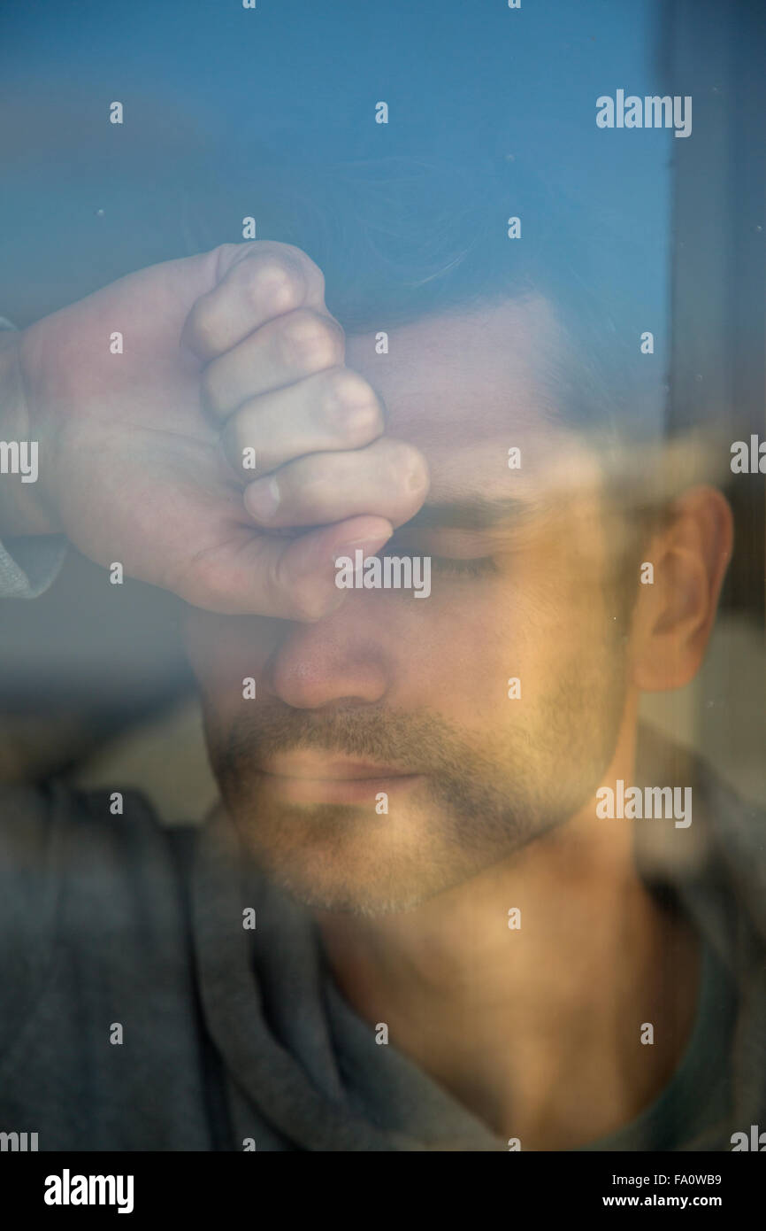 Sad worried male hi-res stock photography and images - Alamy