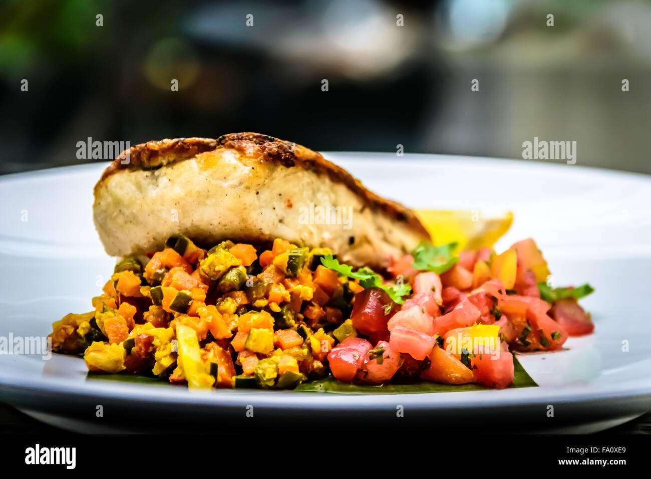 Pan fried white snapper Stock Photo - Alamy