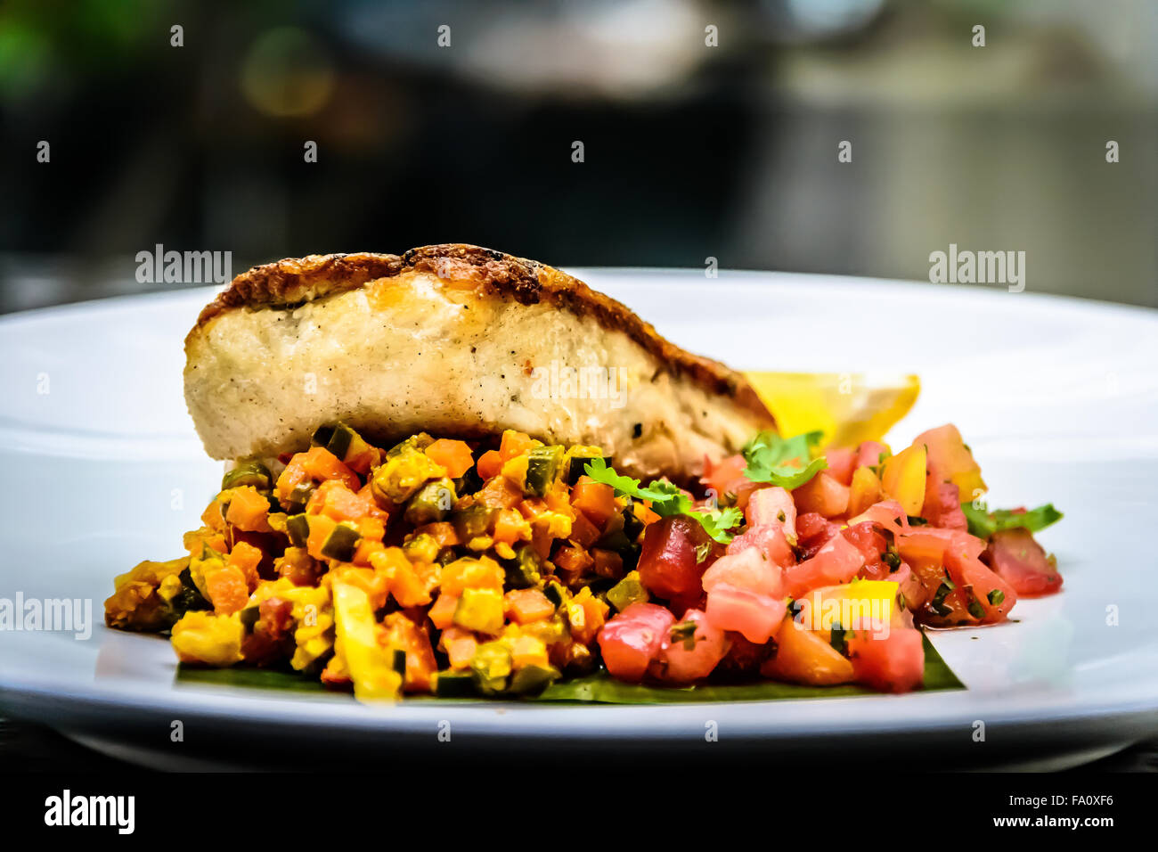 Pan fried white snapper Stock Photo - Alamy