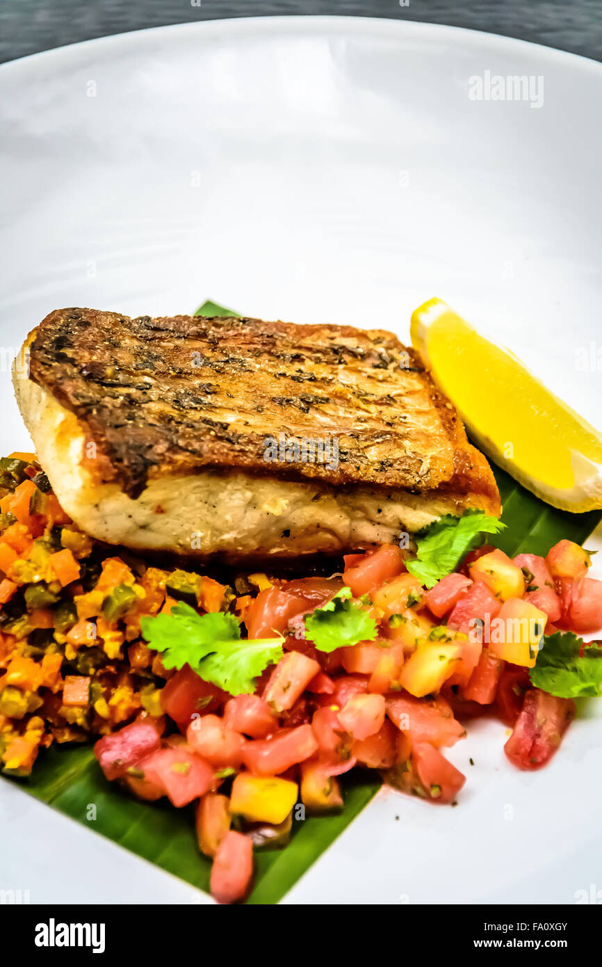 Pan fried white snapper Stock Photo - Alamy
