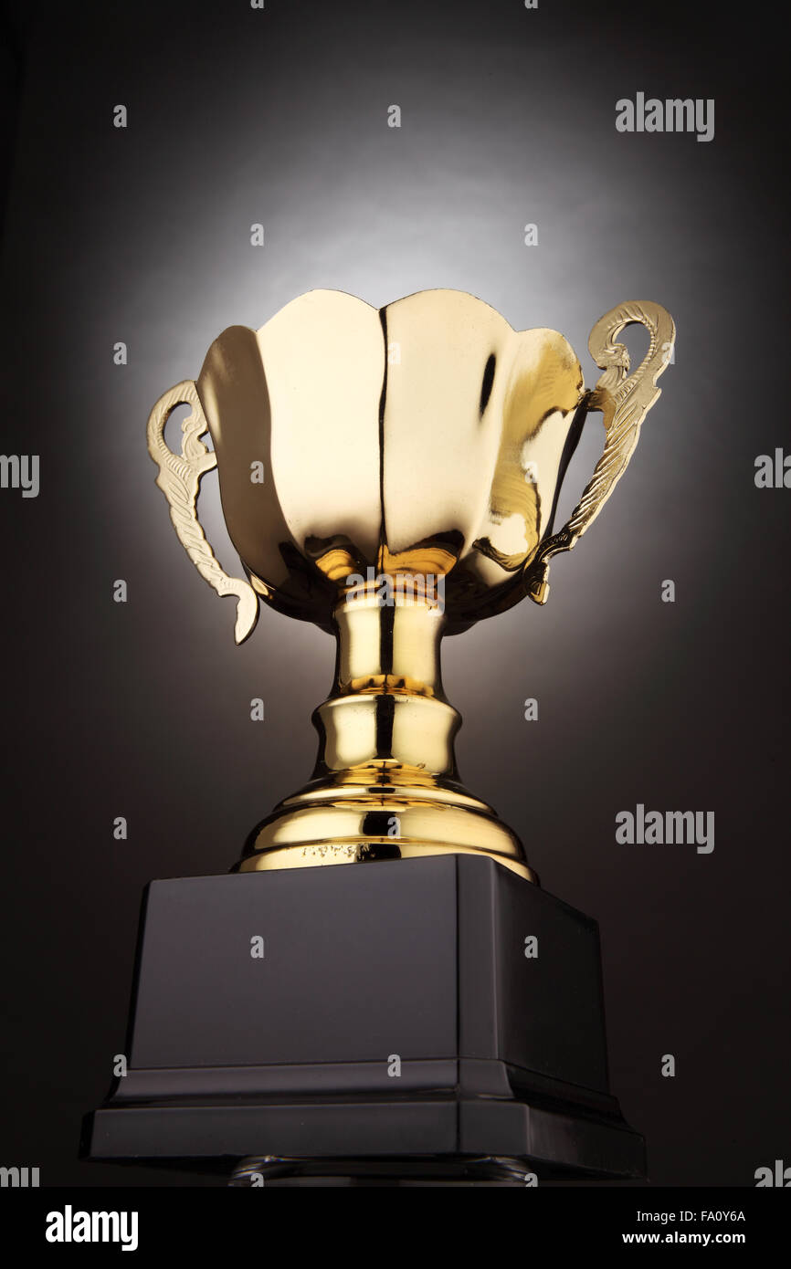 low angle of trophy with glow at the background Stock Photo - Alamy