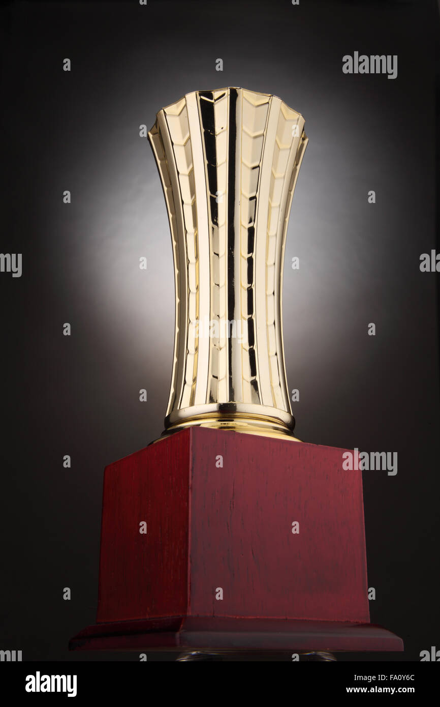low angle of trophy with glow at the background Stock Photo - Alamy