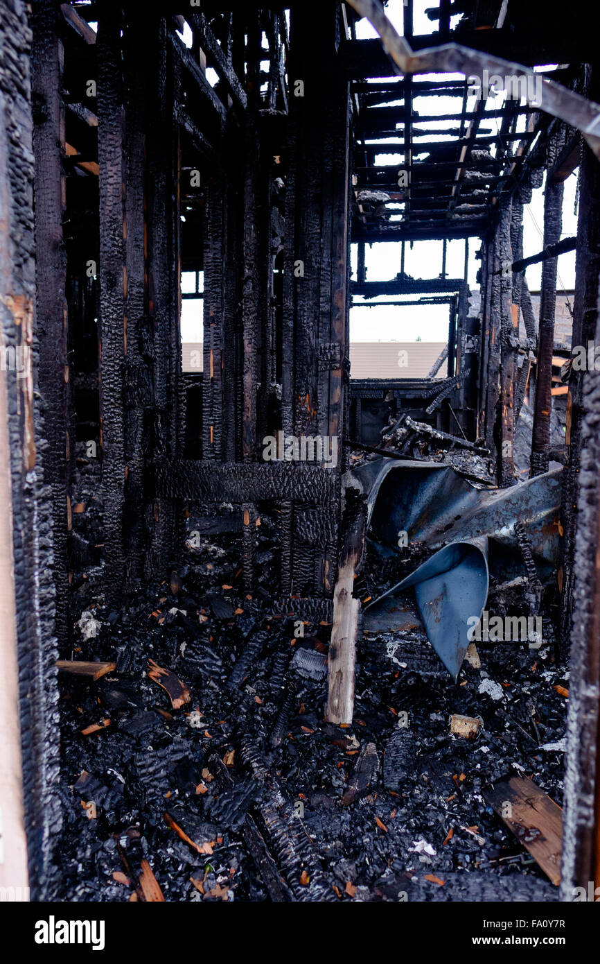 House burned almost completely in a major fire leaving only the damaged ...