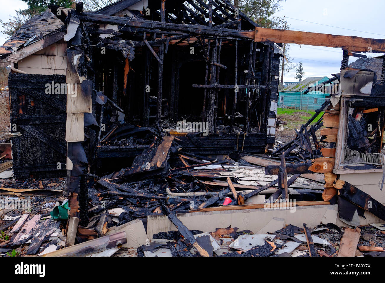 House burned almost completely in a major fire leaving only the damaged ...
