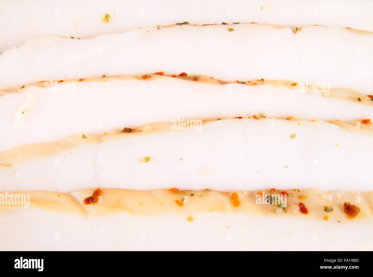 Slice of hot smoked squid Stock Photo - Alamy