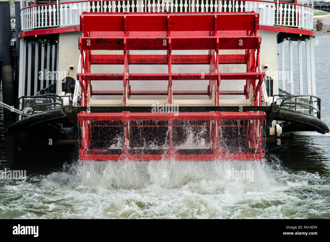 A red water wheel churns in the Mississippi River Stock Photo - Alamy