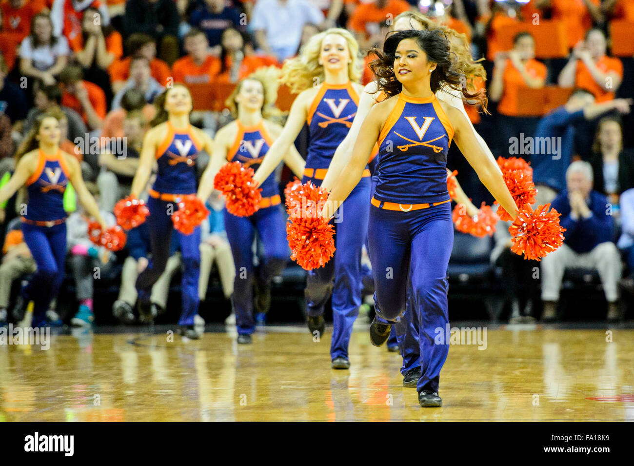The Virginia Cavaliers Cheerleaders And Dancers During The Ncaa Basketball Game Between The