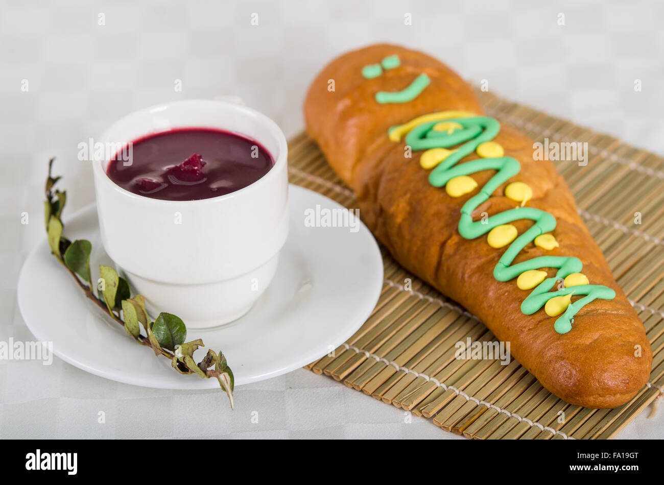 Traditional ecuadorian food, guaguas de pan and colada morada Stock ...