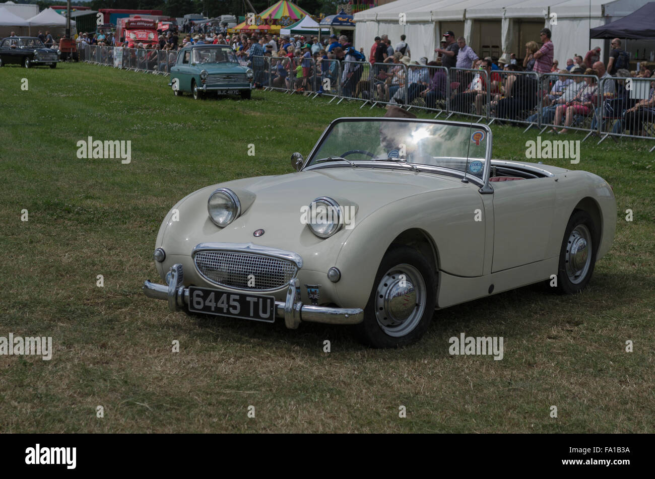 Austin Healey "Frog Eye" Sprite on parade at a classic car show Stock ...