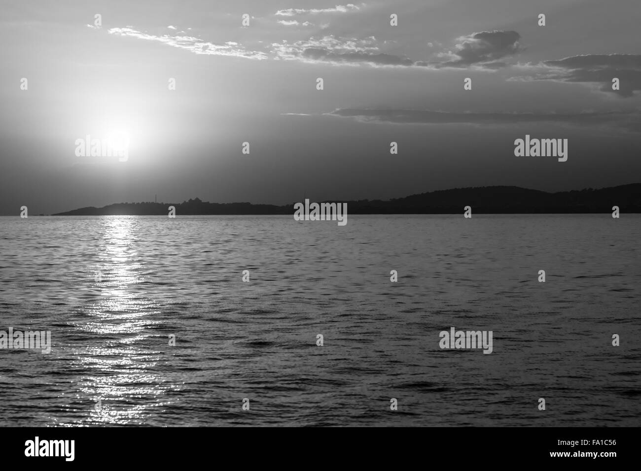 View ocean sunset sunset over Black and White Stock Photos & Images - Alamy