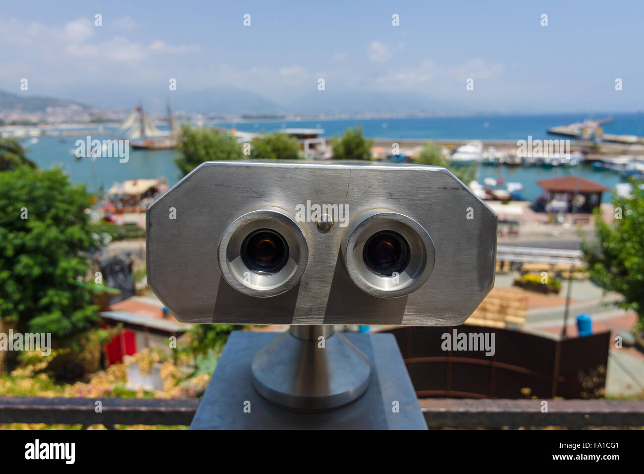 Sighting place with a view of the sea port. Binocular close-up in the ...