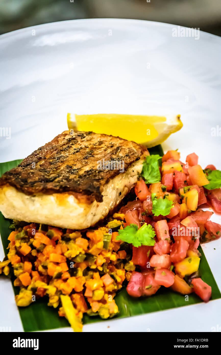 Pan fried white snapper Stock Photo - Alamy