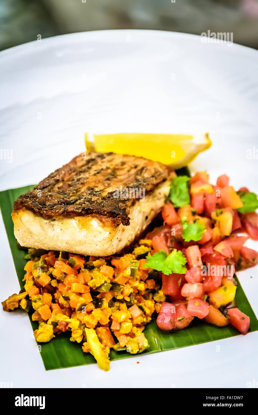 Pan fried white snapper Stock Photo - Alamy