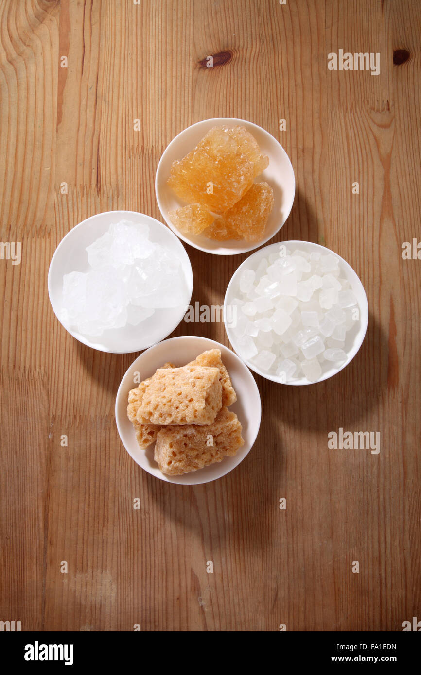 sugar types in white bowls, white wood table background Stock Photo - Alamy