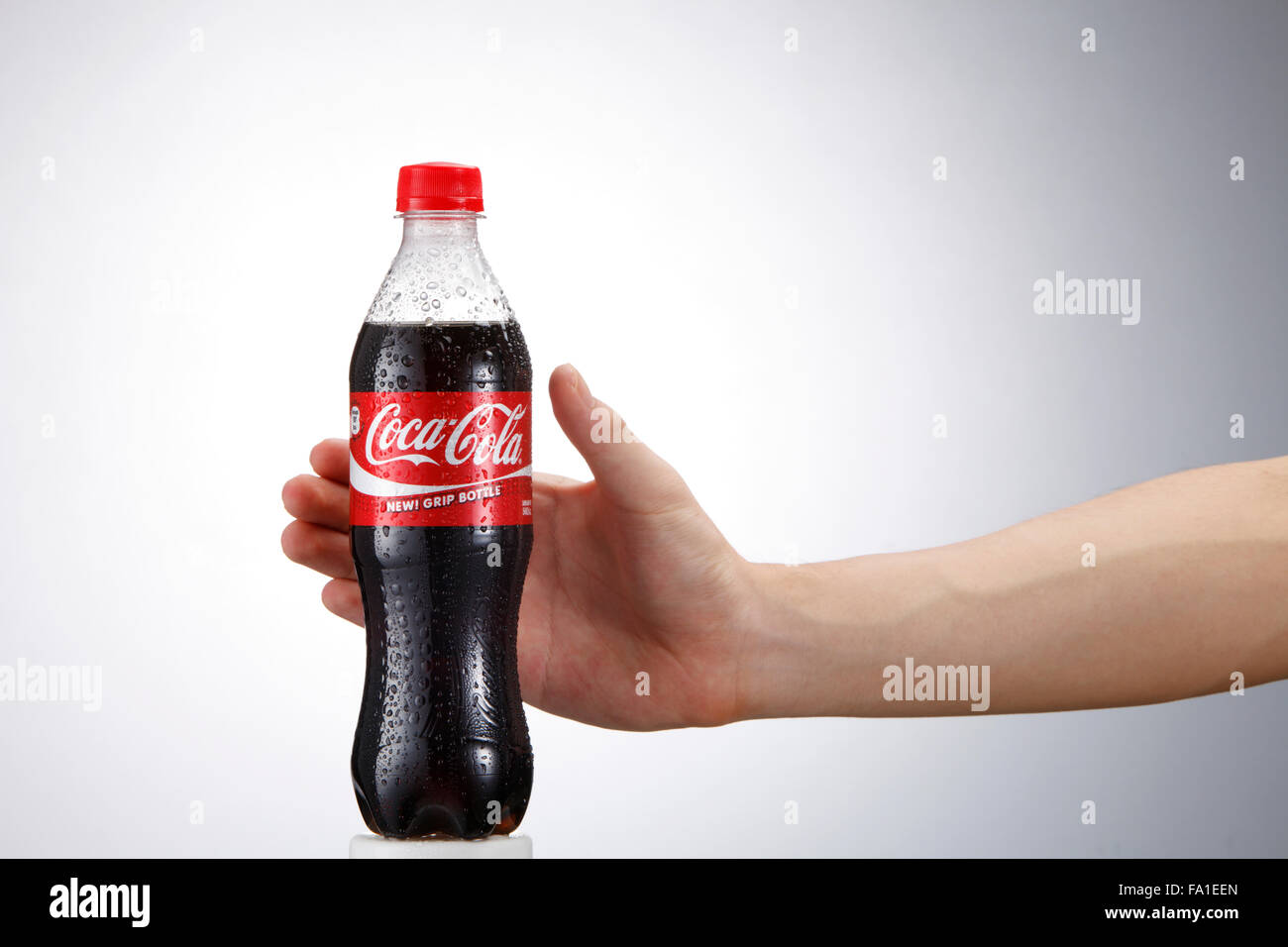 Kuala Lumpur,Malaysia 9th April 2015, Hand hold a bottle Coca-Cola on ...