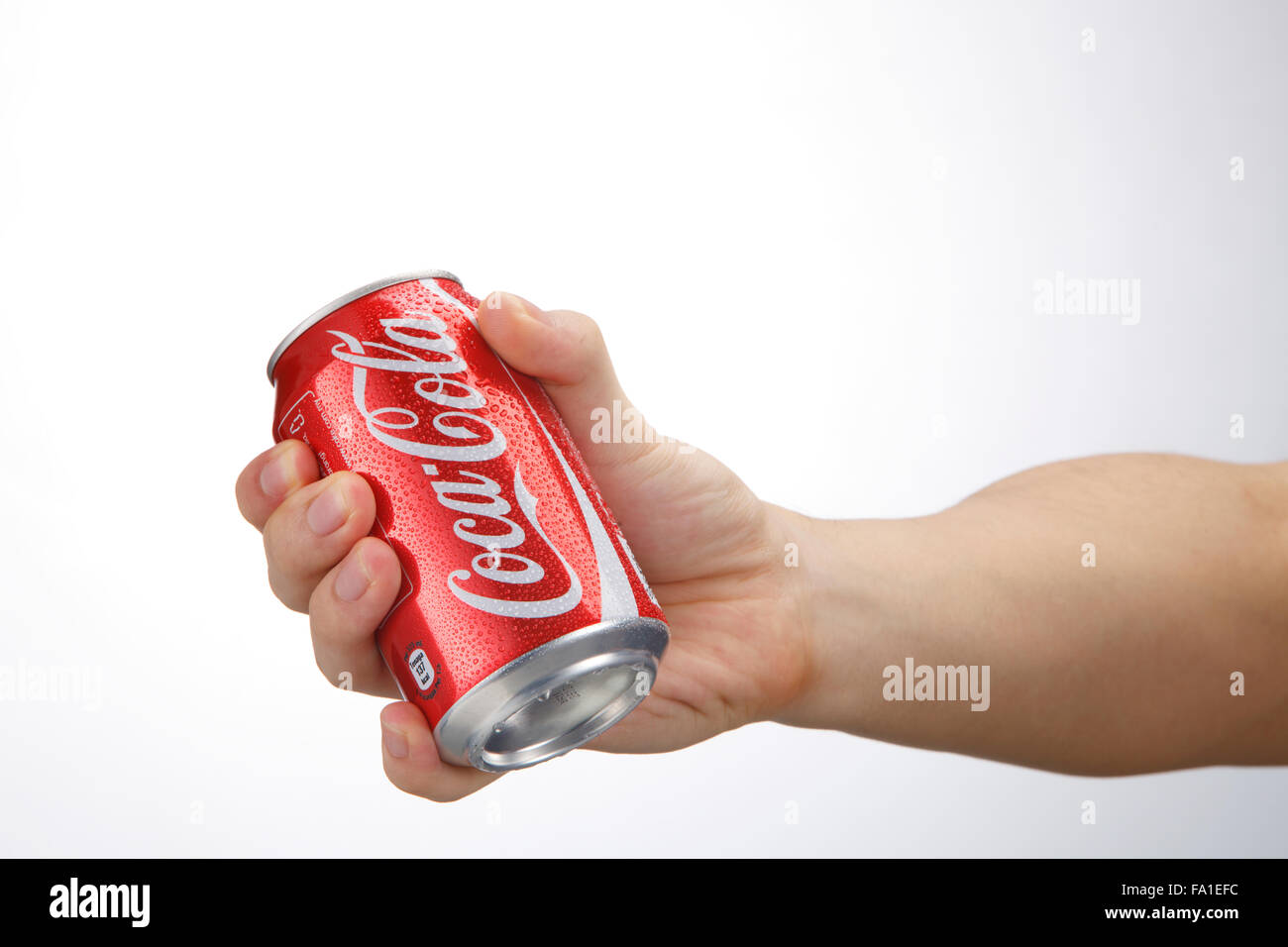 Kuala Lumpur,Malaysia 9th April 2015, hand holding a red Coca Cola can ...