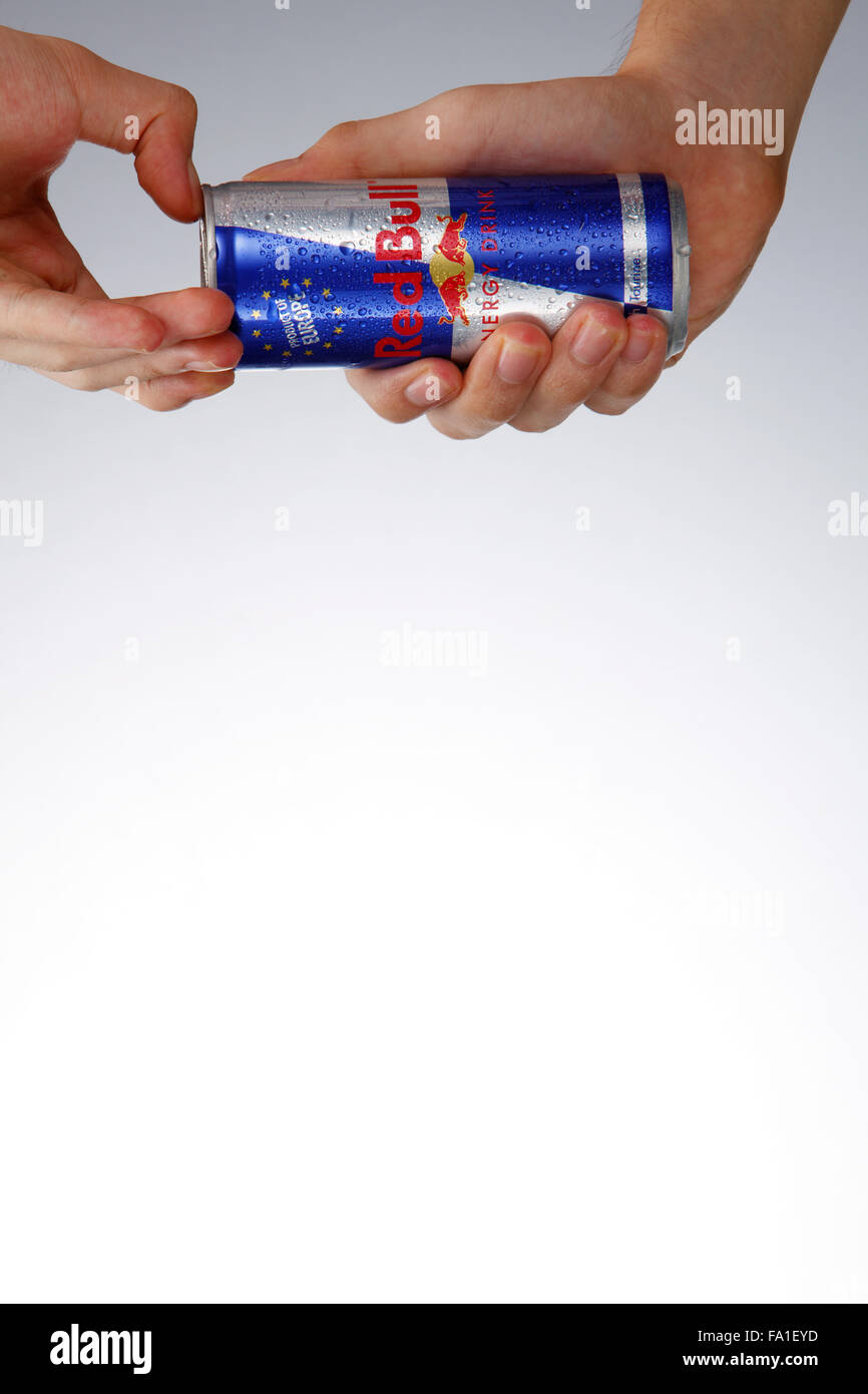 Kuala Lumpur,Malaysia 9th April 2015,Hand opening can of Red Bull ...