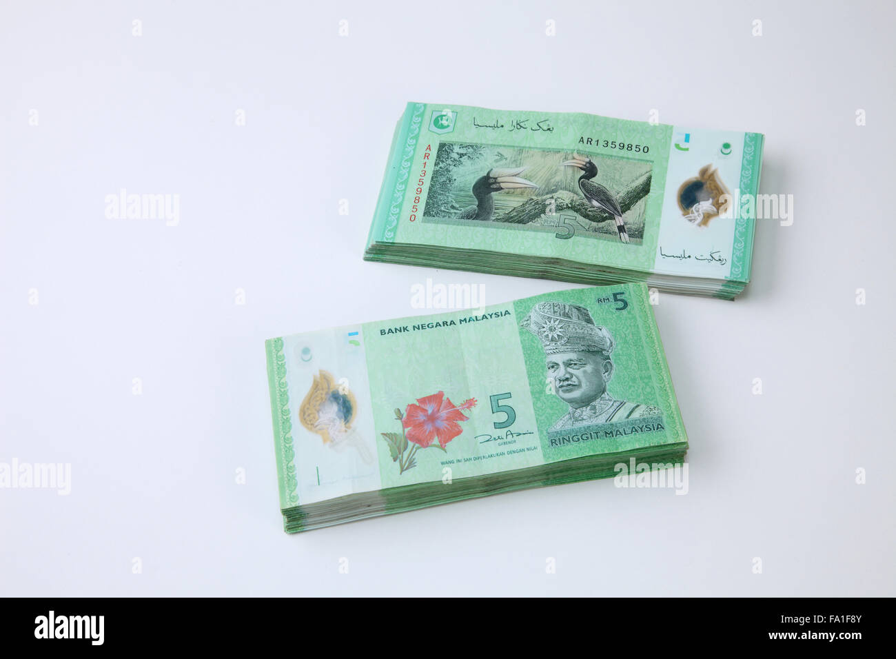 stack of the Malaysia ringgit 5dollar Stock Photo - Alamy