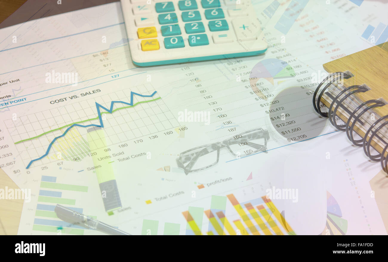 Financial paper charts and graphs on the table Stock Photo - Alamy