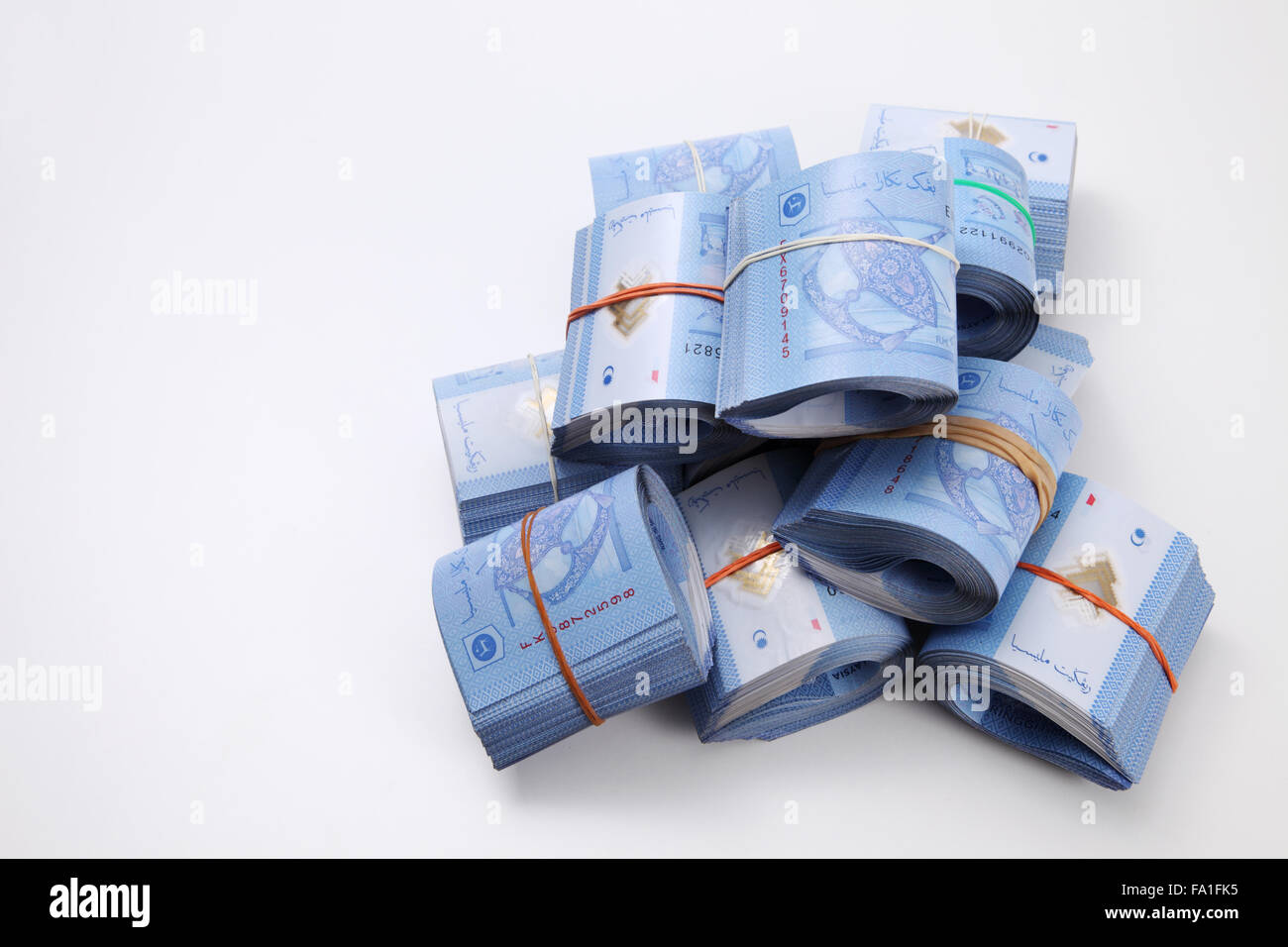 Malaysia Ringgit one Ringgit rolled up Stock Photo - Alamy