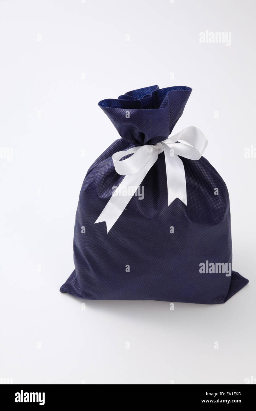 blue color bag with ribbon Stock Photo - Alamy