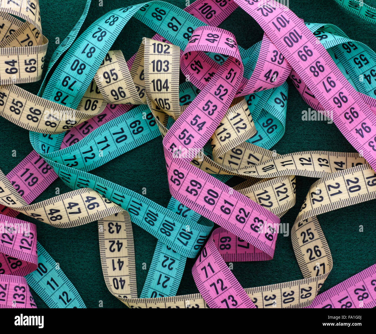 Colorful measuring tapes pile hi-res stock photography and images - Alamy