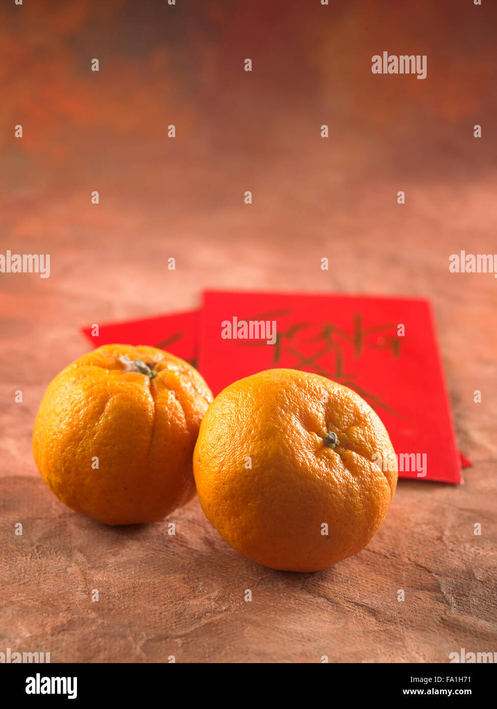 concept image of the chinese new year -mandarin orange and red packet ...