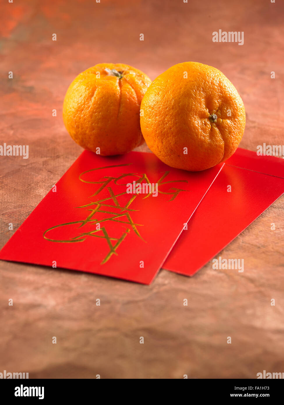 concept image of the chinese new year -mandarin orange and red packet ...
