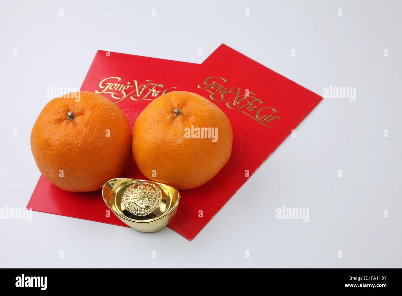chinese new year celebration mandarin orange with ang pao and ingot ...