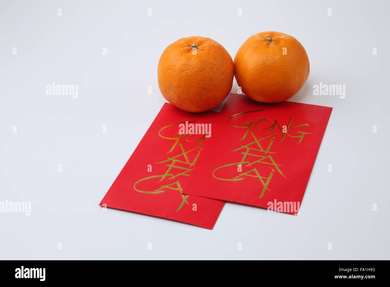 chinese new year celebration mandarin orange with ang pao Stock Photo ...