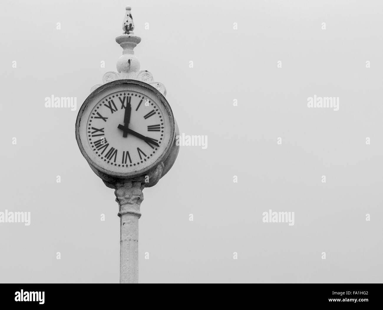 Clock on pole Black and White Stock Photos & Images - Alamy