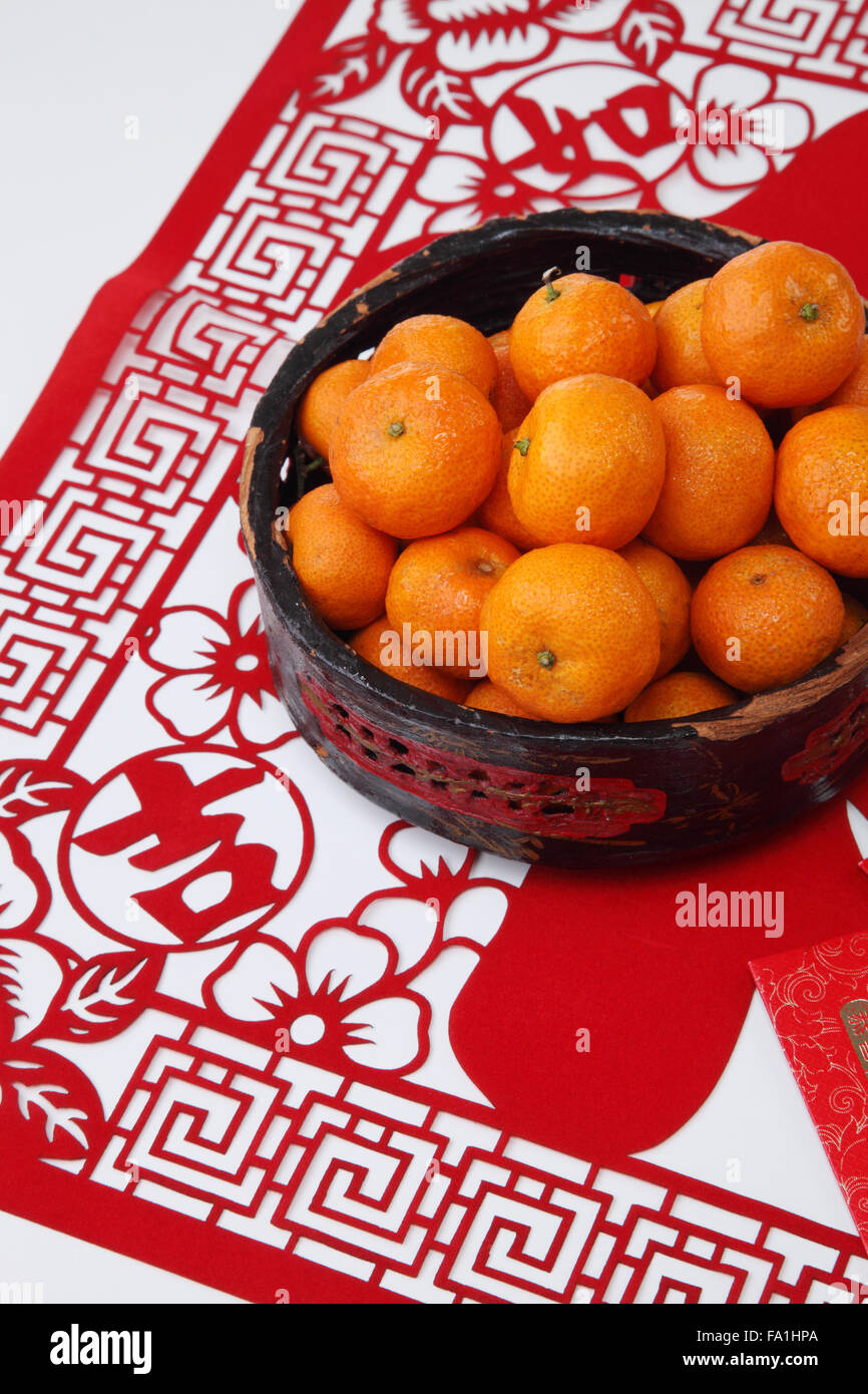 mini mandarin oranges in the container Stock Photo - Alamy