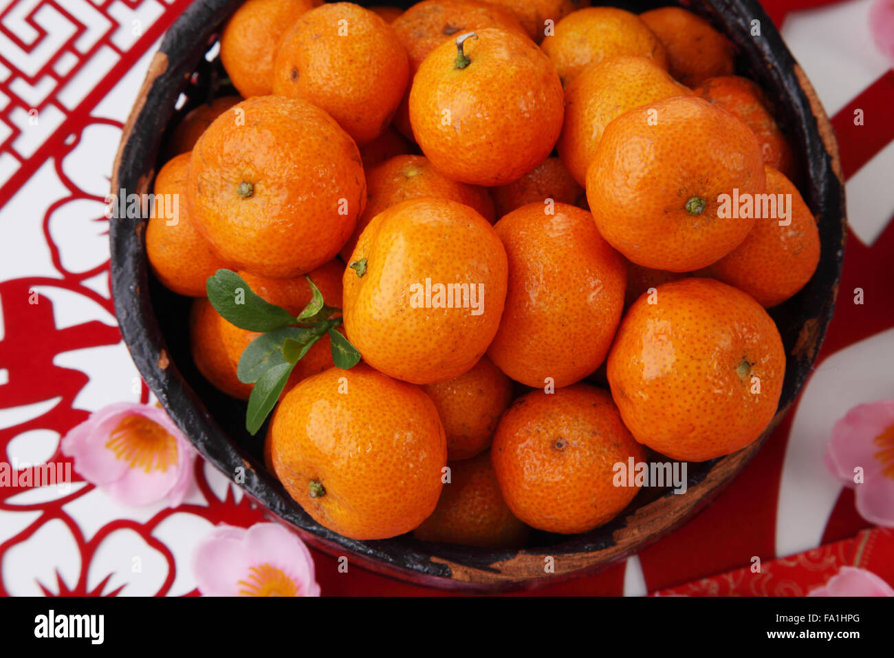 mini mandarin oranges in the container Stock Photo - Alamy