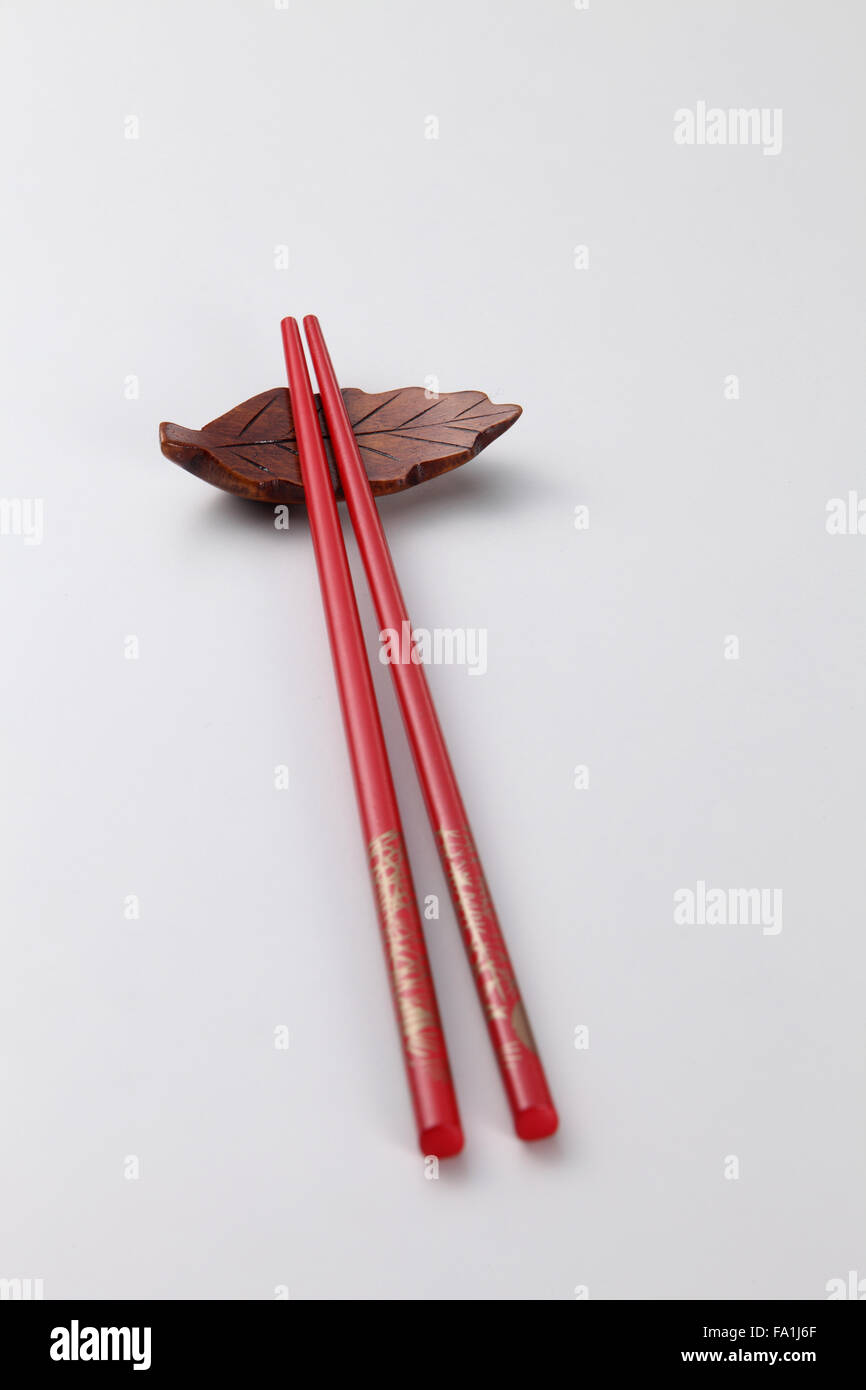 Pair of chopsticks on white background Stock Photo - Alamy